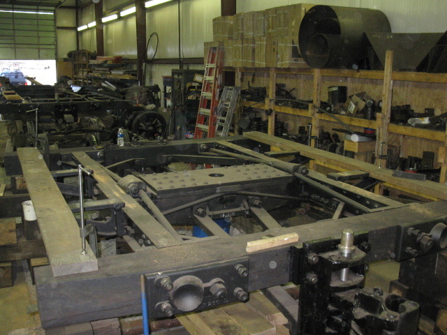 Fitted outside frame tank support boards in place on water tender truck ...
